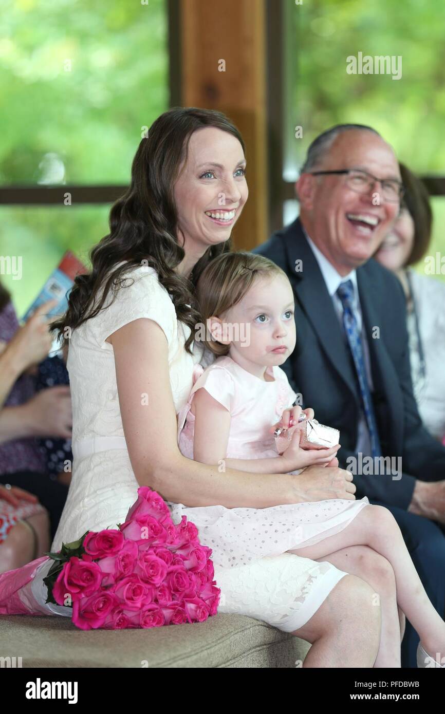 The wife of U.S. Marine Corps Lt. Col. Jan Durham, left, deputy ...