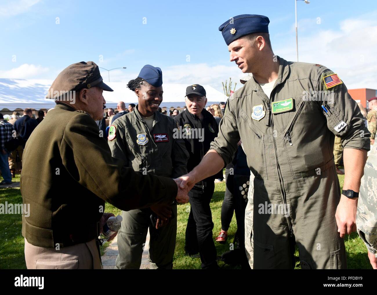 Maj. Nathan Rieber, 61st Airlift Squadron pilot, speaks to D-Day ...