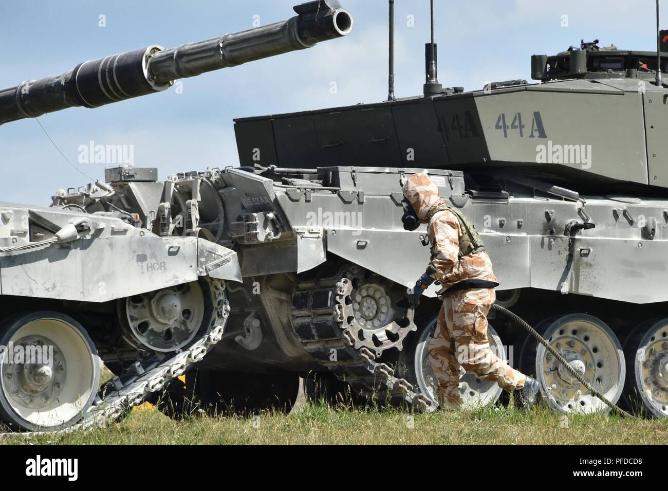 A British soldier with the Queen’s Royal Hussars prepares a Challenger ...