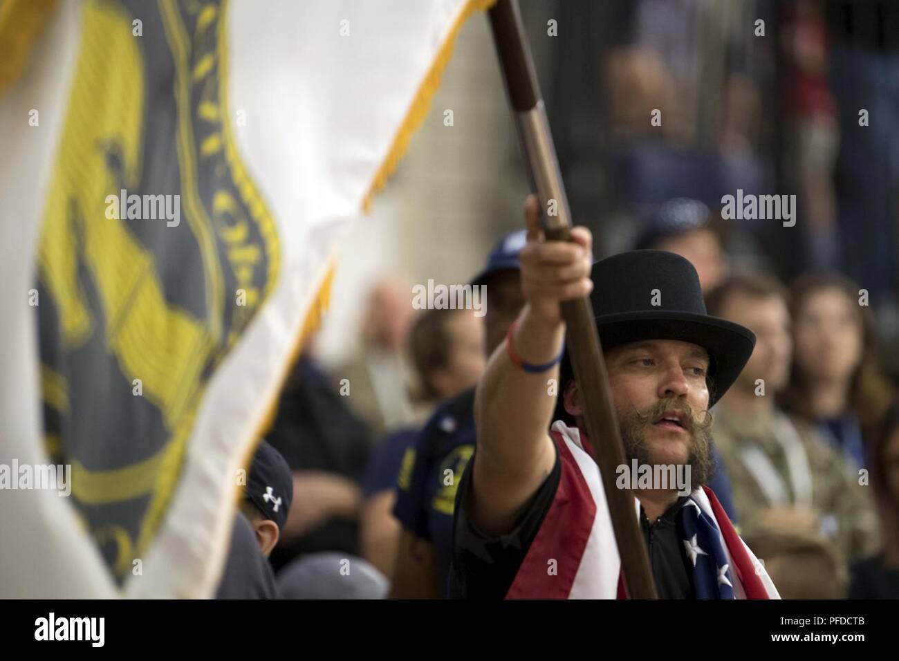 Retired Marine Corps Staff Sgt. John Stanz waves a Special Operations ...