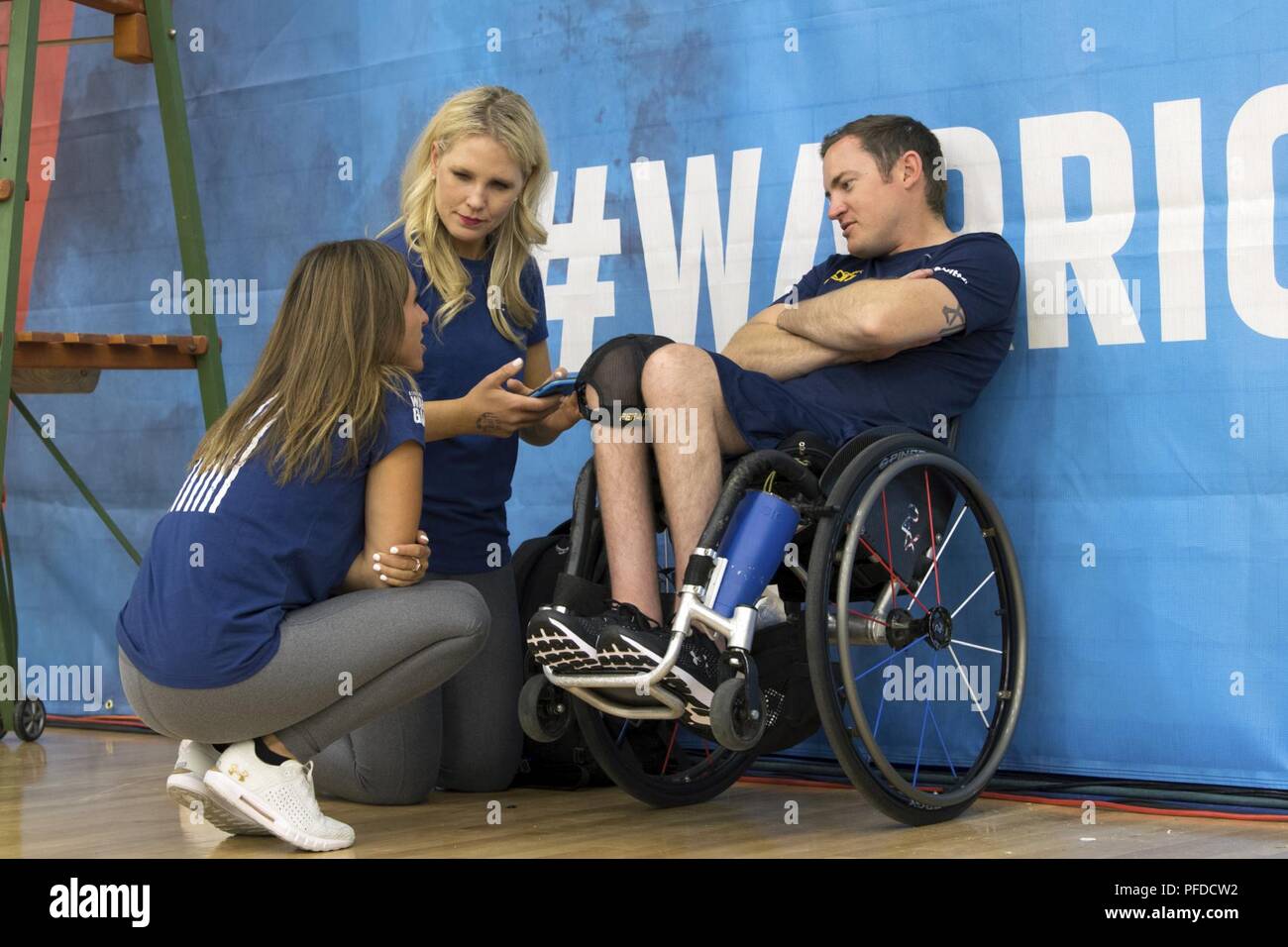Navy veteran Airman Chance Field kicks back in his wheel chair as he ...