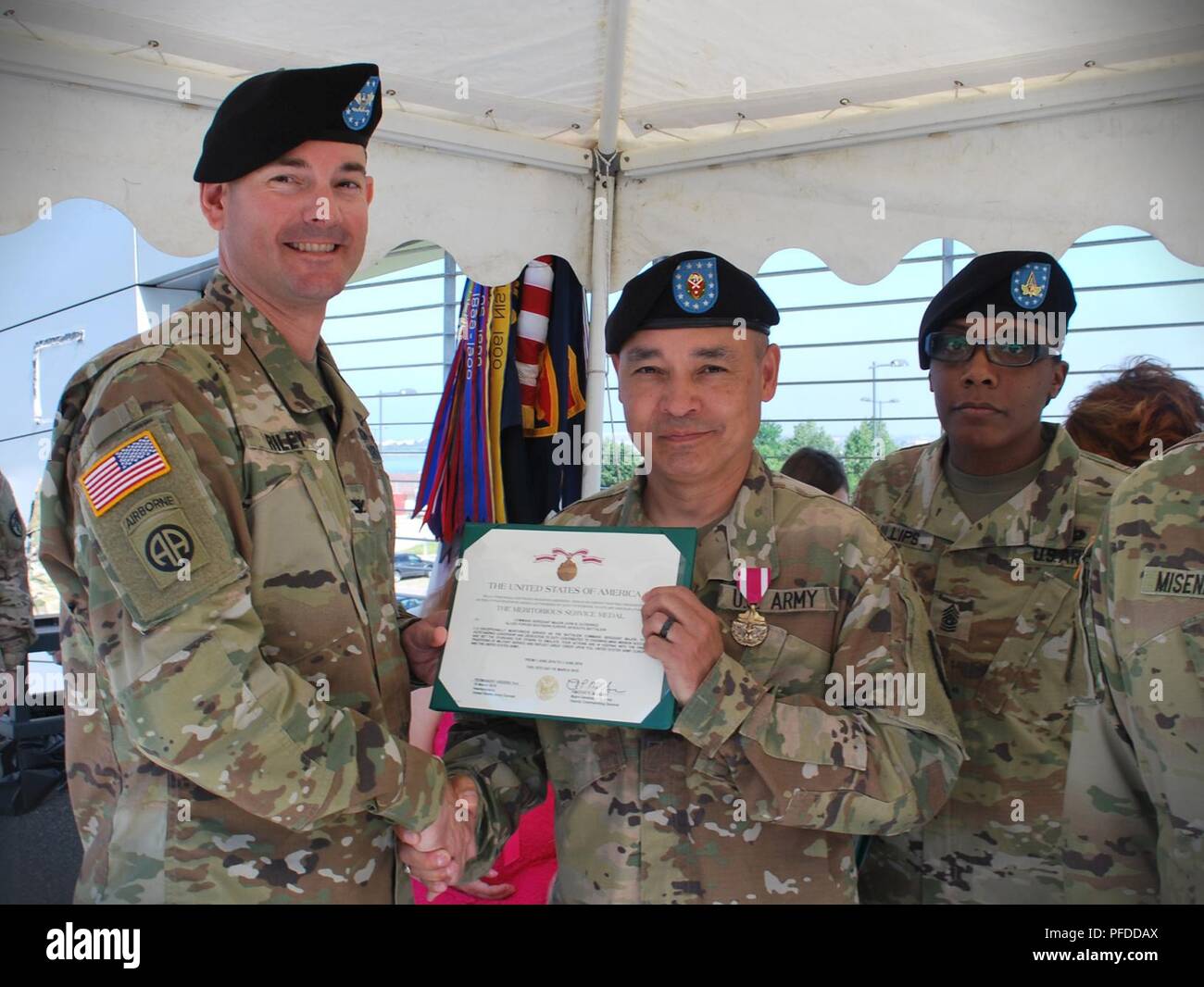 Command Sgt. Maj. John Gutierrez was presented with a Meritorious ...