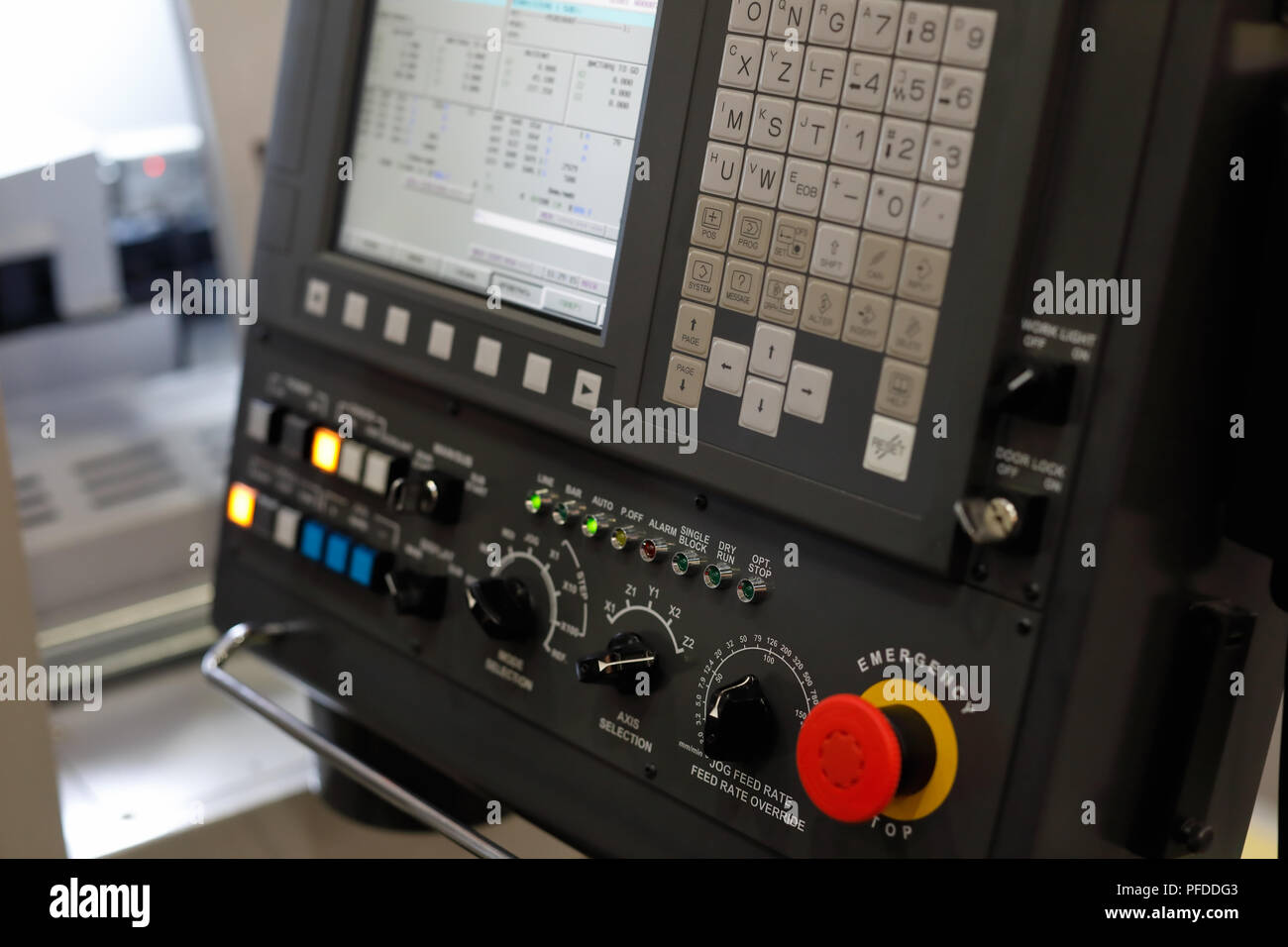CNC control panel of metalworking machining center. Selective focus ...