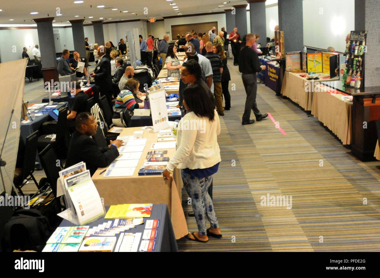 Soldiers and family members attending the Yellow Ribbon program event ...
