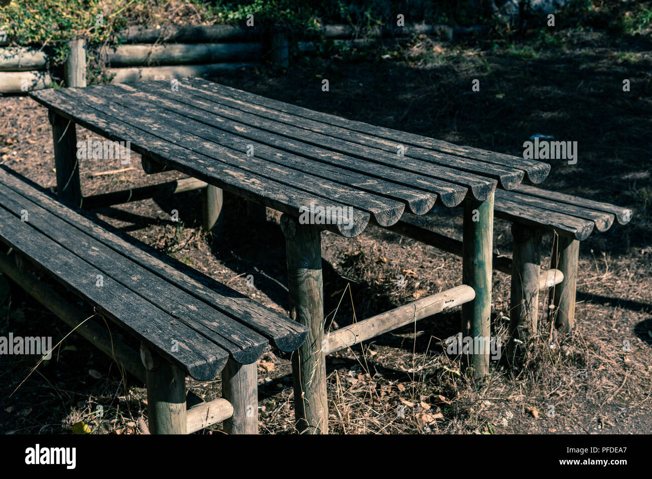 Moody picnic bench Stock Photo - Alamy