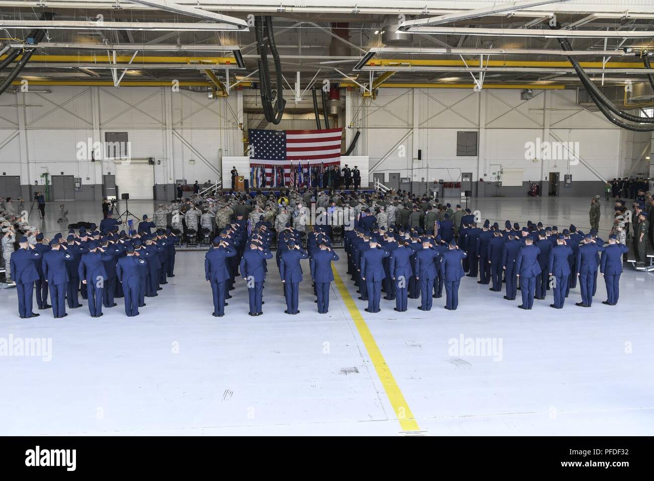 Members of the 5th Bomb Wing salute during the 5th BW change of command ...