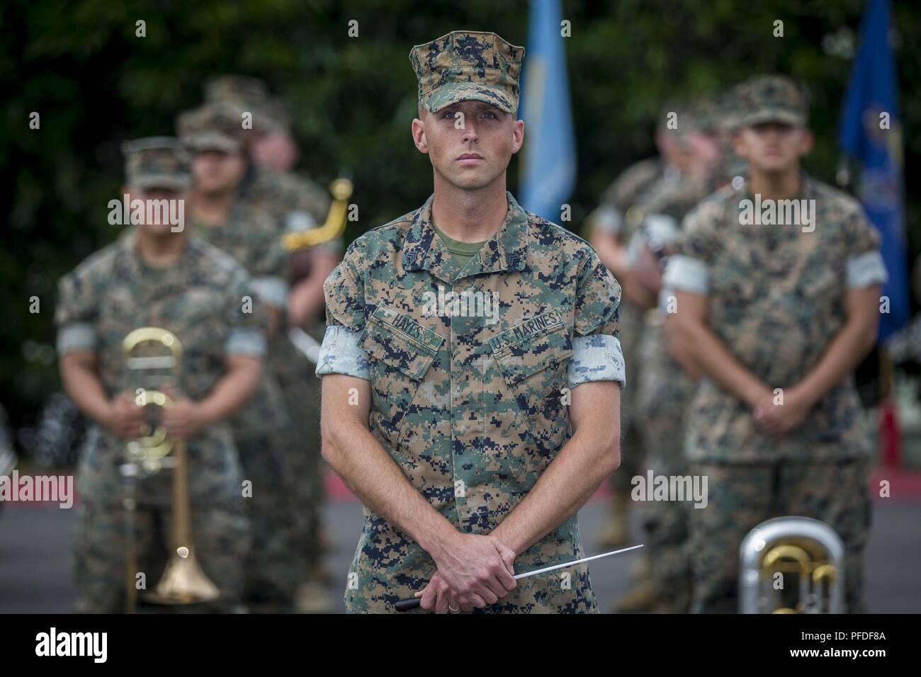 Sgt. Wesley O. Hayes, musician, 1st Marine Division Band, stands during ...