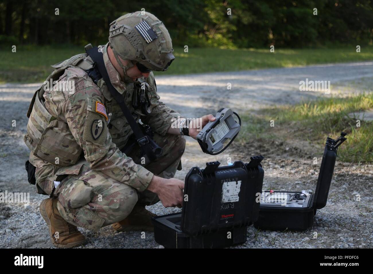Spc. Barry Craig, an explosive ordnance disposal team member with 704th ...