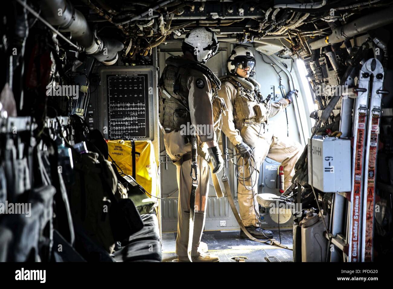 U.S. Marine Corps Cpl. David Diaz, right, Crew Chief with Marine Medium ...