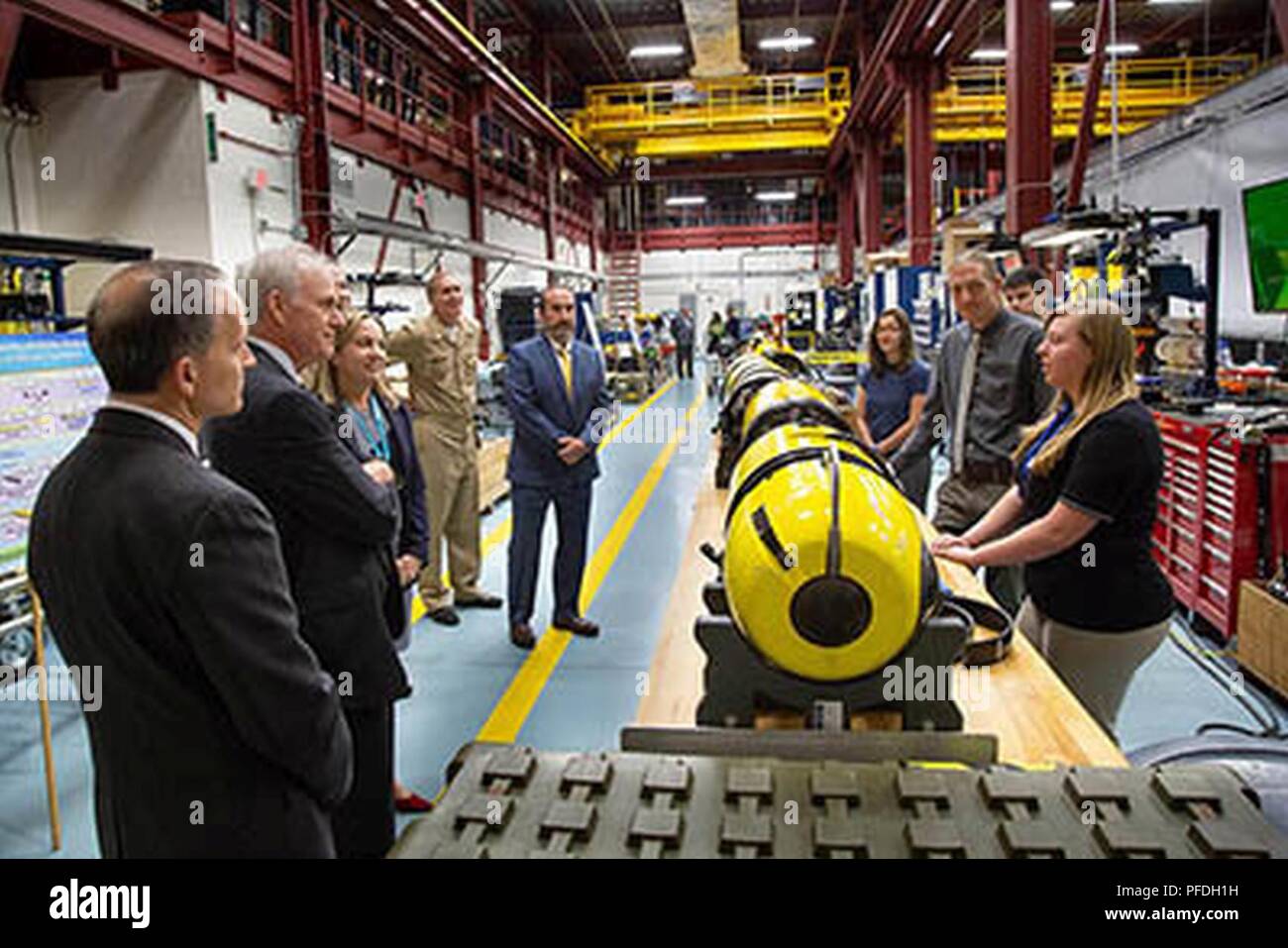 Naval Undersea Warfare Center Division Newport employees Kaitlyn Barros (right side), Michael ...