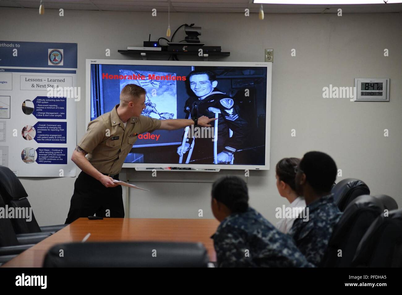Hospital Corpsman HM3 Austin D. Agnello gives a presentation on the ...