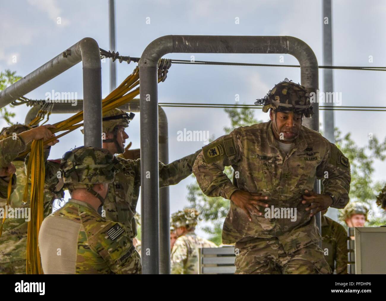 A paratrooper from the 173rd Airborne Brigade practices exiting the ...