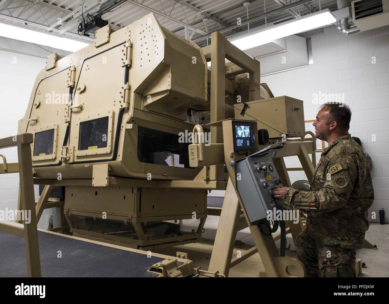 Minot Air Force Base Airmen participate in a Humvee rollover simulation ...
