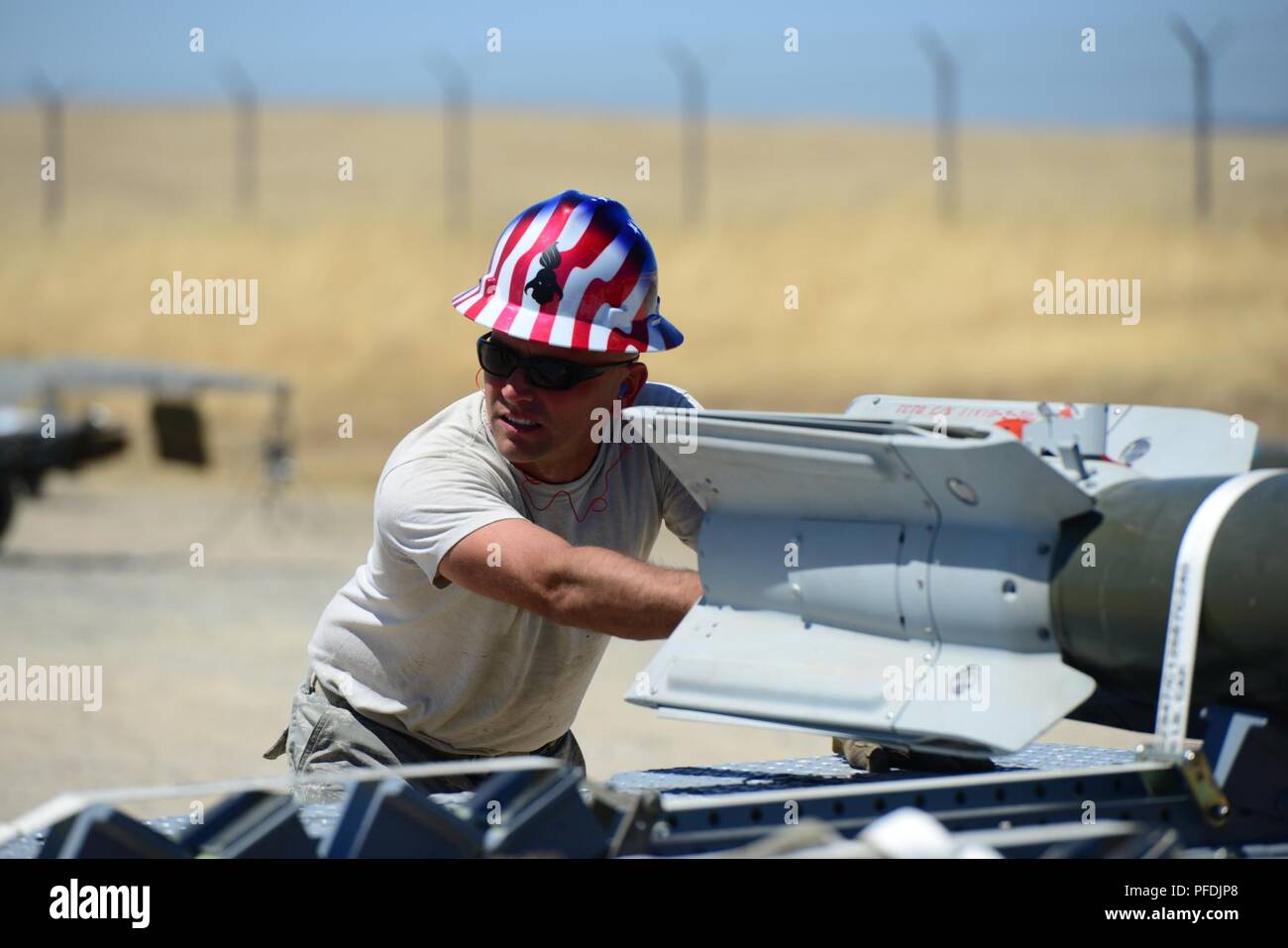 U.S. Air Force Tech. Sgt. Kristopher Tremaine, 7th Munitions Squadron senior munitions ...