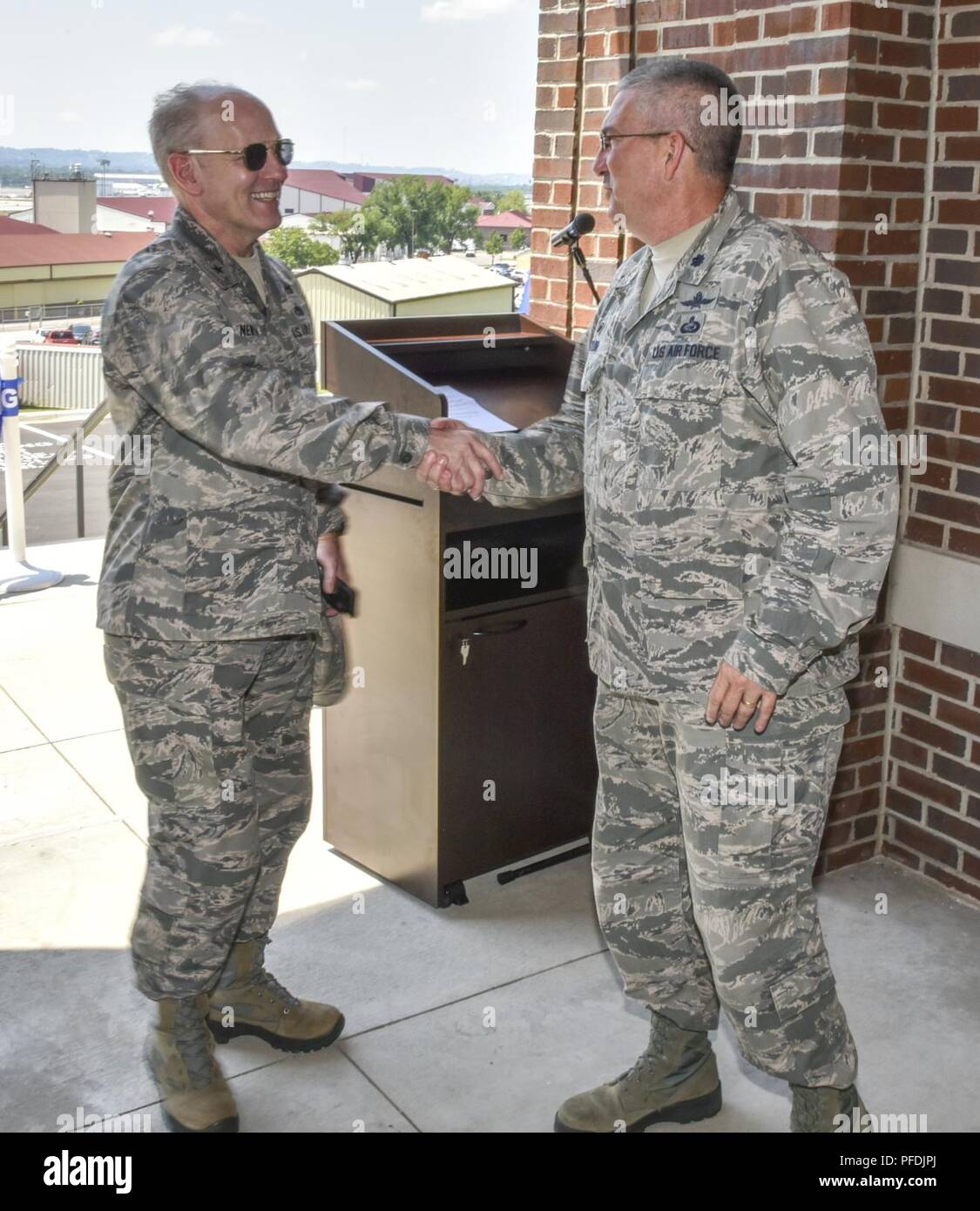 Brig. Gen. Jeff Newton is greeted by Lt. Col. Jon Michael Tayler during ...