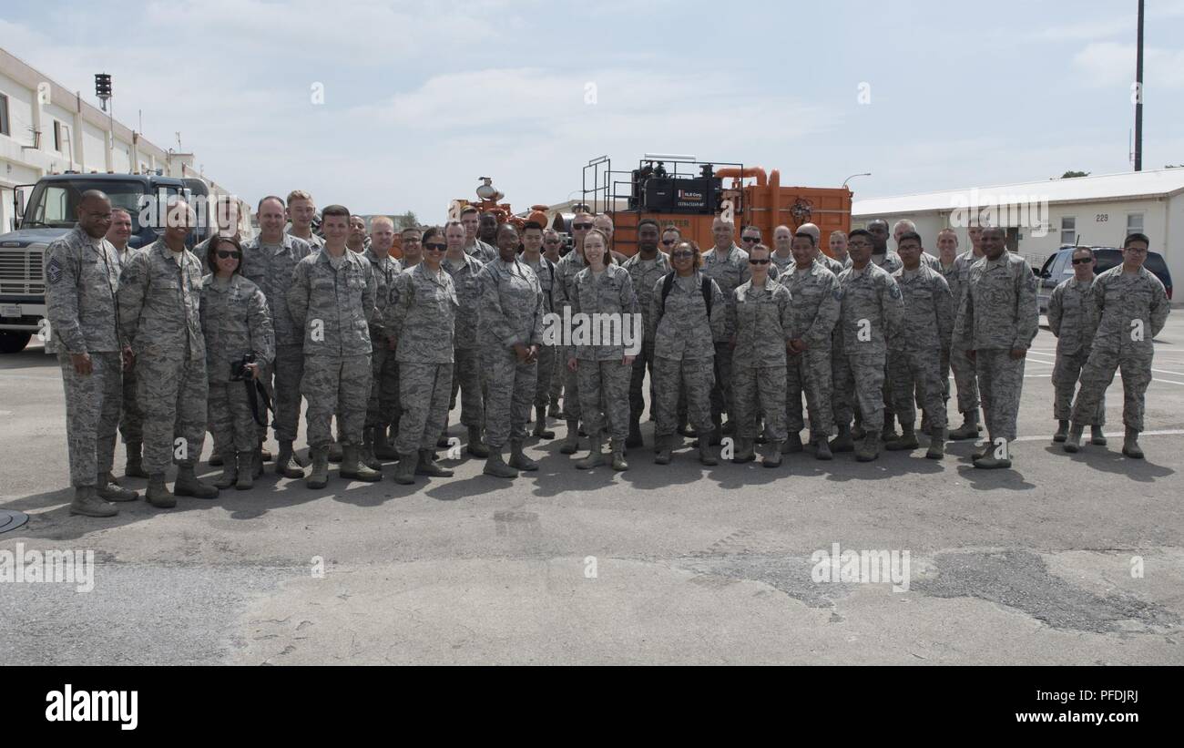 Members of 18th Civil Engineer Squadron pose for a photo with Air ...