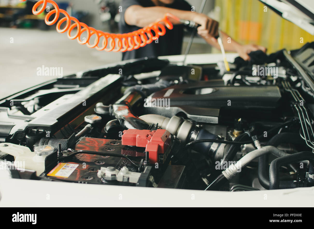Man checking car engine Stock Photo - Alamy