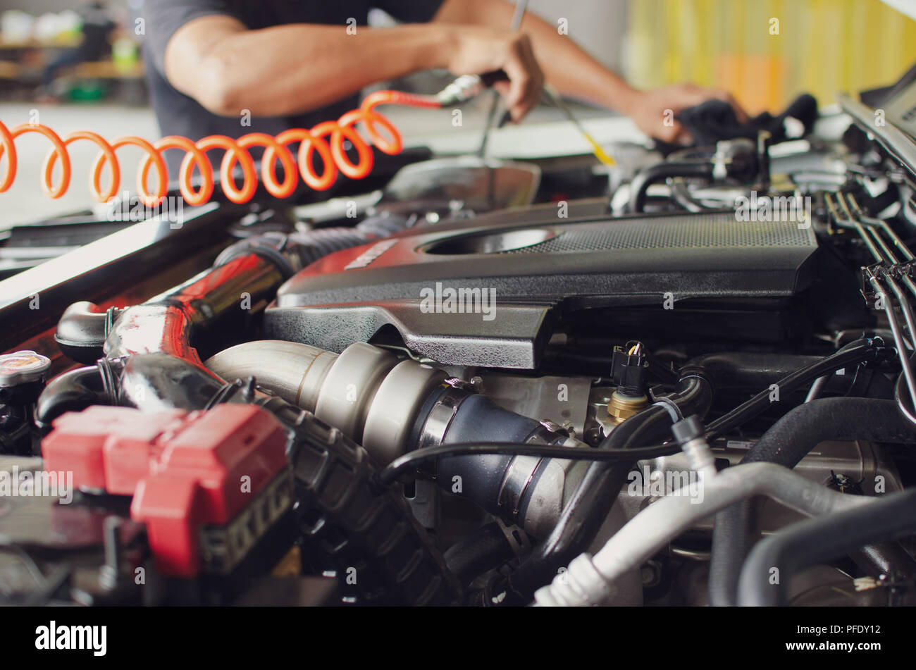 Man checking car engine Stock Photo - Alamy