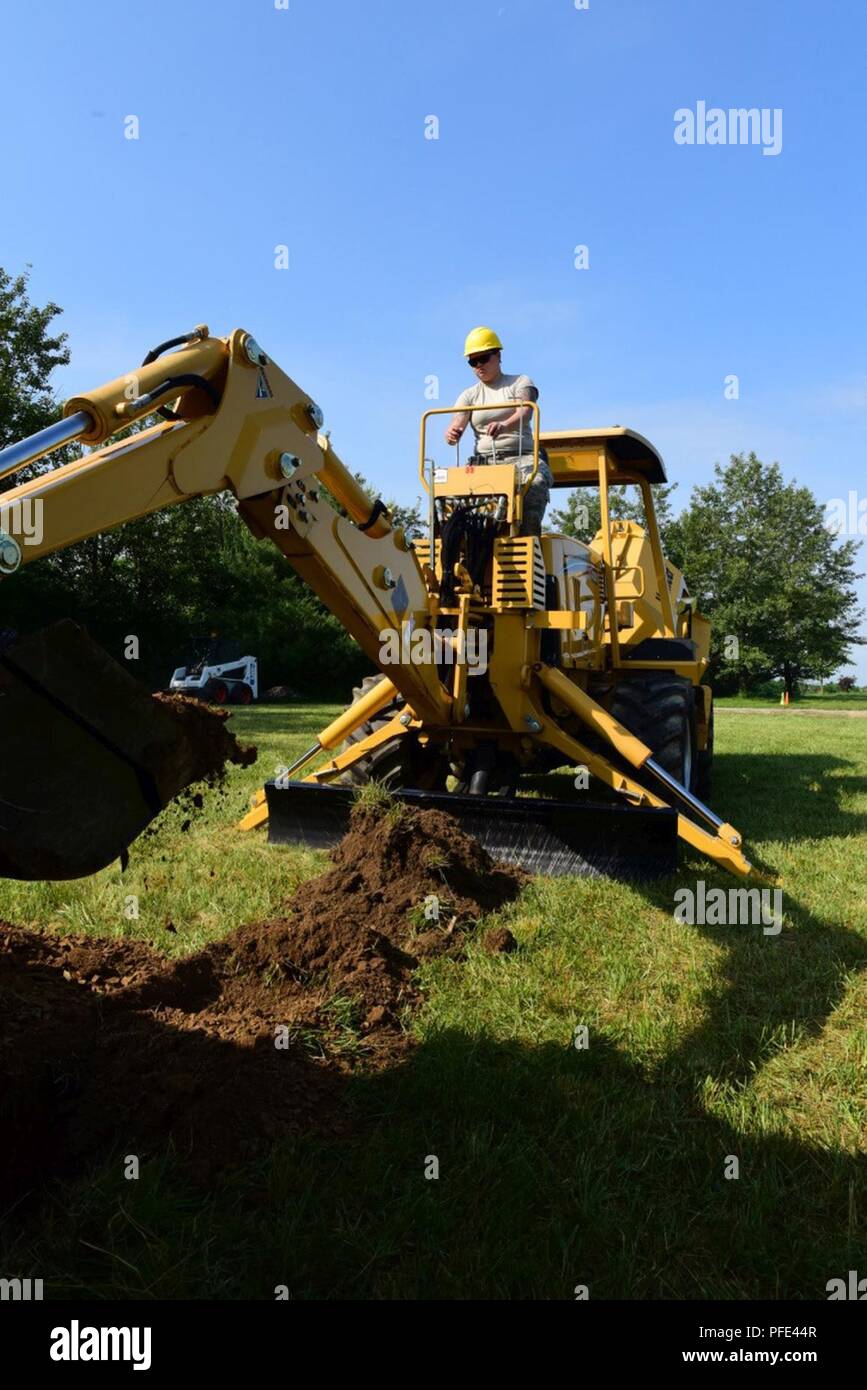 Staff Sgt. Heather Holmes, a cable technician with the 211th ...
