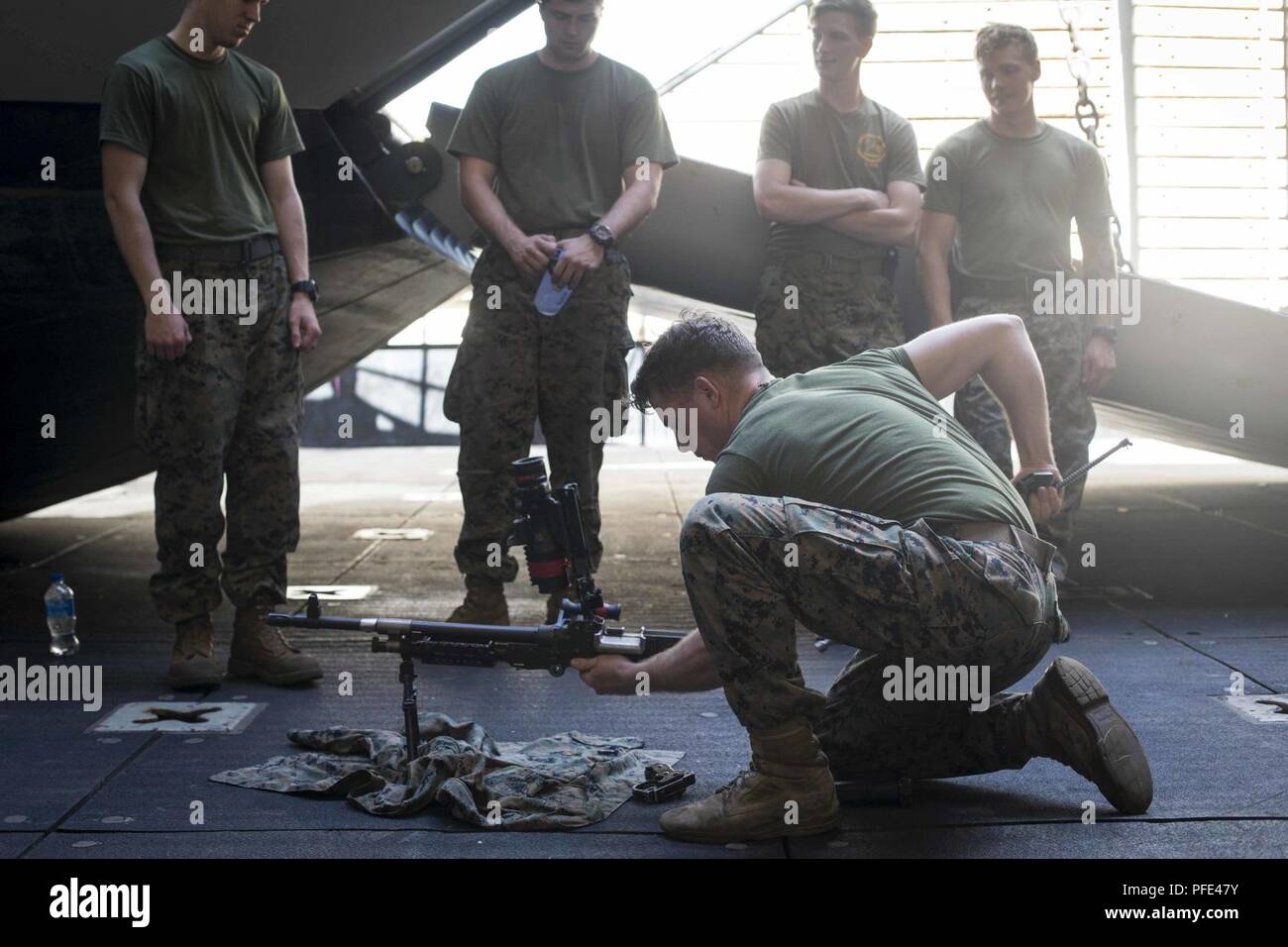 U.S. Marine Lance Cpl. Marcus Keys, a radio operator with Weapons ...