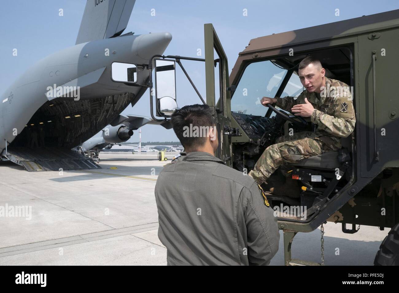 Hawaii Air National Guard Staff Sgt. Josh Moracco, 204th Airlift ...