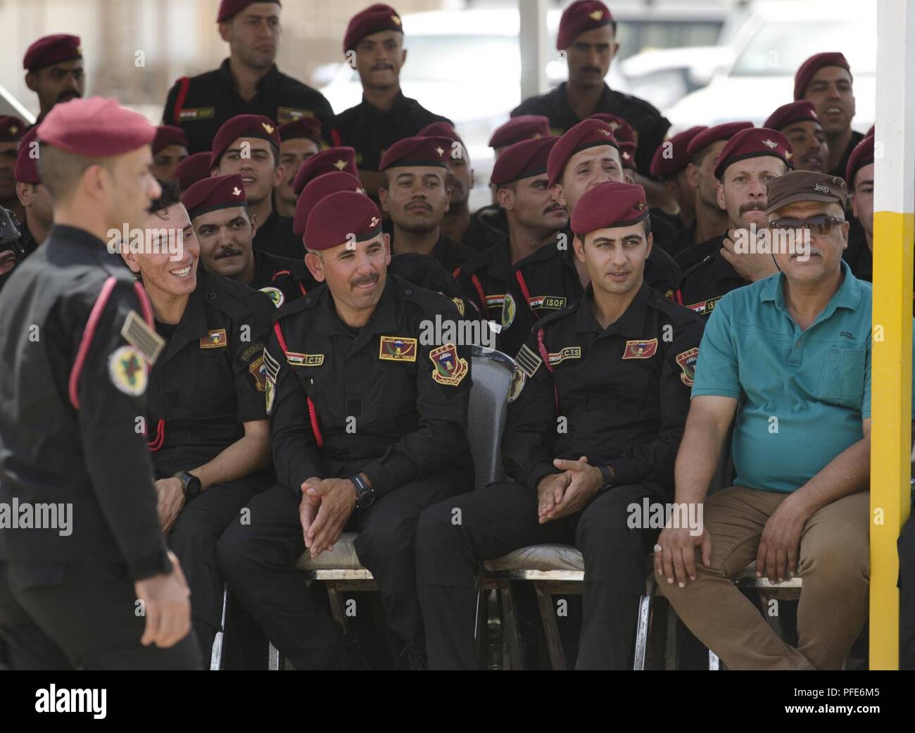 Members of the Iraqi Counter Terrorism Service observe various ...