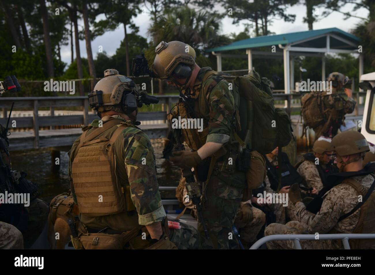 U.S. Marine Corps Raiders with the 3d Marine Raider Battalion ride on a ...