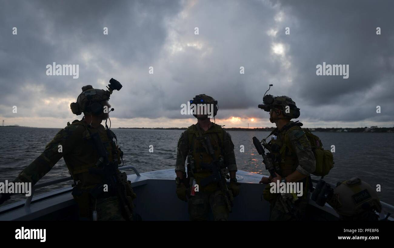U.S. Marine Corps Raiders with the 3d Marine Raider Battalion ride on a ...