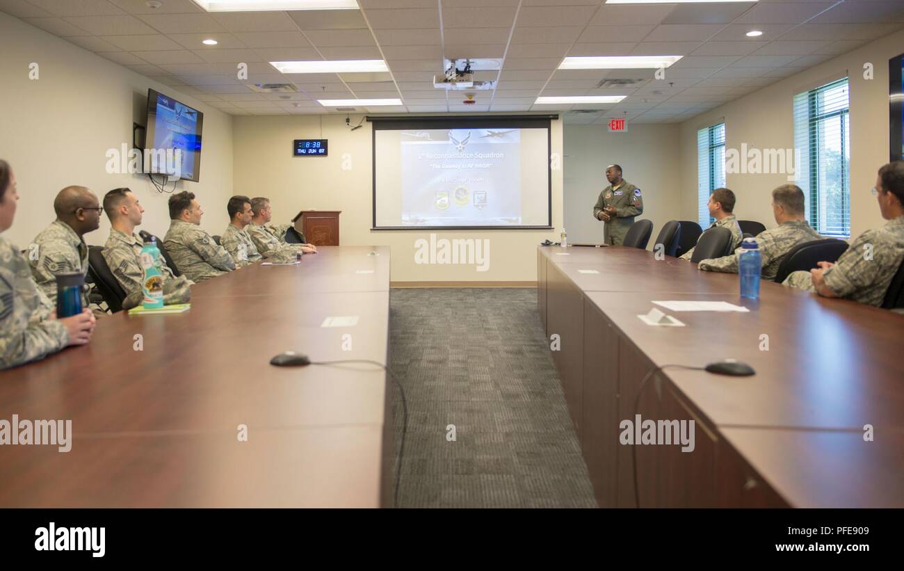 U-2 "Dragonlady" pilot Major Kris "Judge" Duckett briefs members of the ...