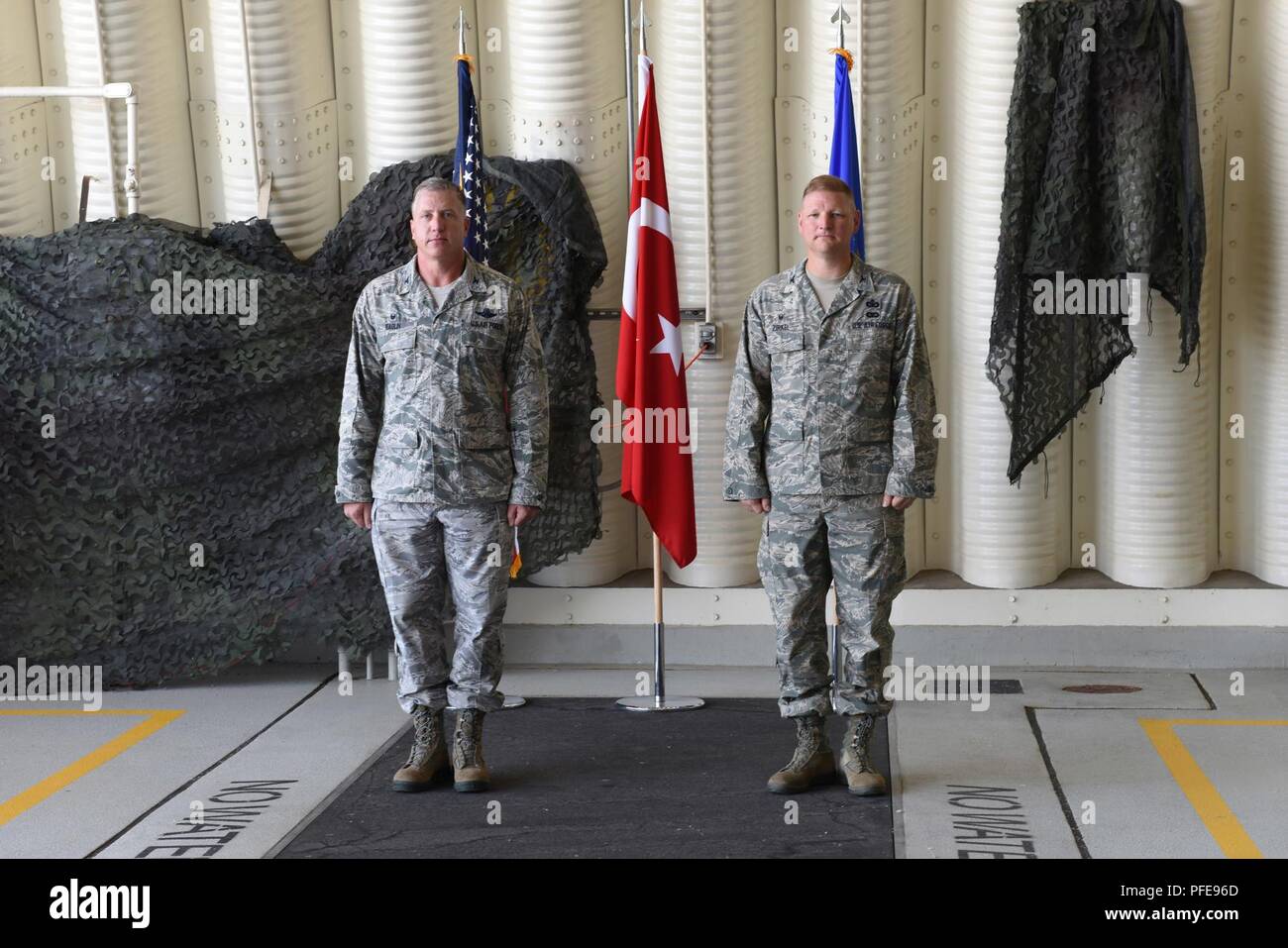 U.S. Air Force Col. David Eaglin, 39th Air Base Wing commander, presents U.S. Air Force Col ...