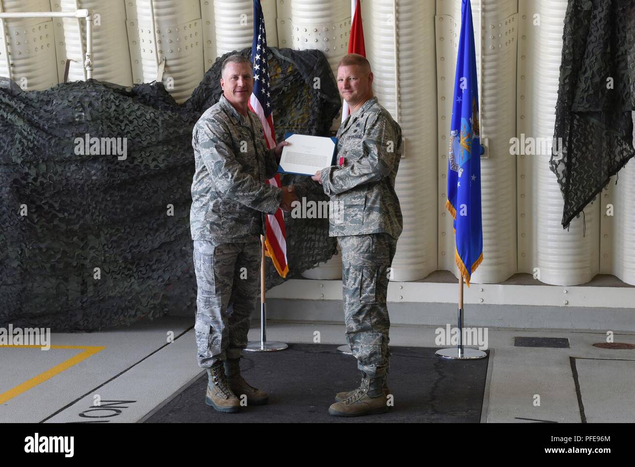U.S. Air Force Col. David Eaglin, 39th Air Base Wing commander, presents U.S. Air Force Col ...