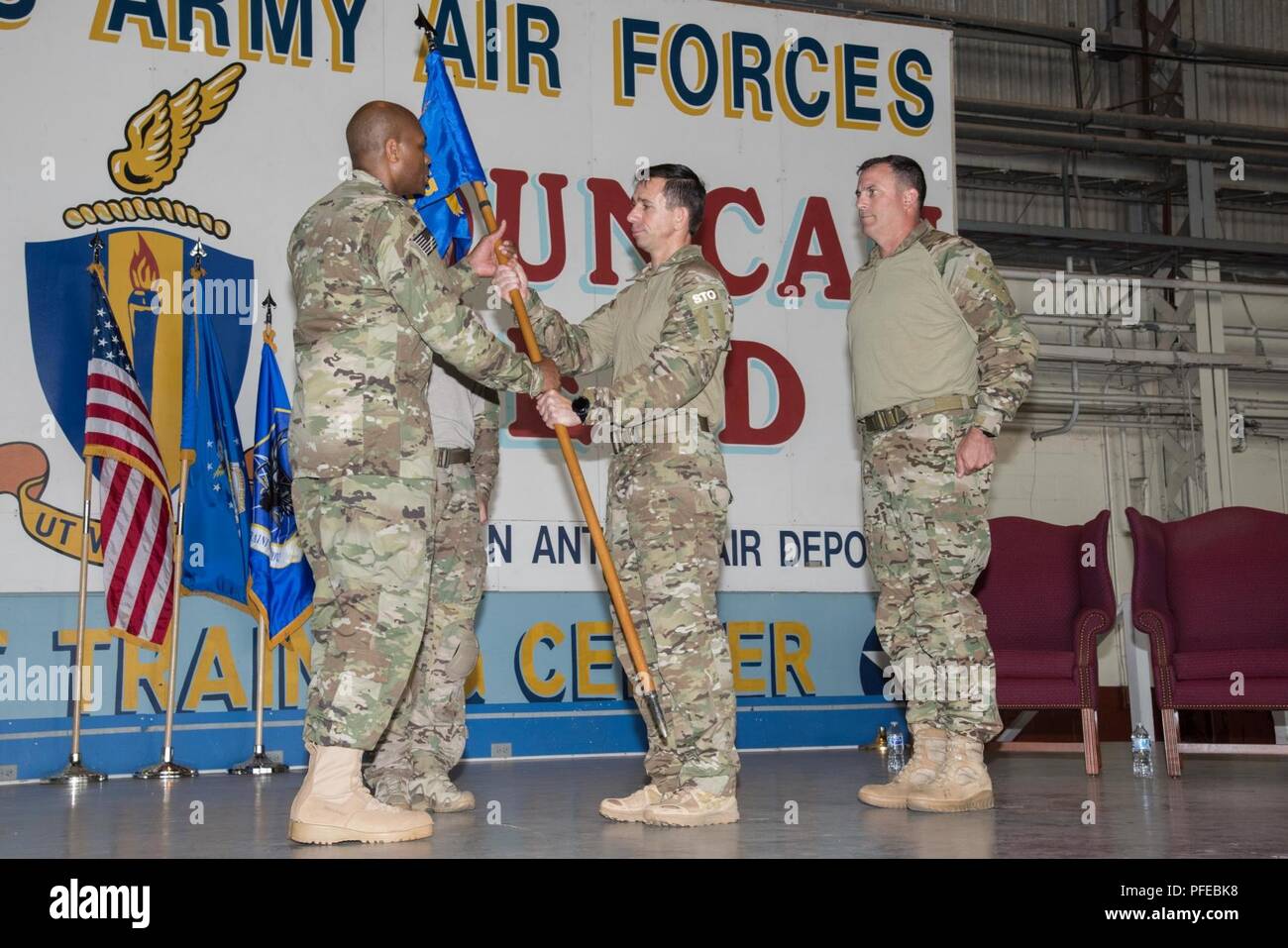 Col. Ron Stenger (right), out-going 350th BATG commander, relinquishes ...