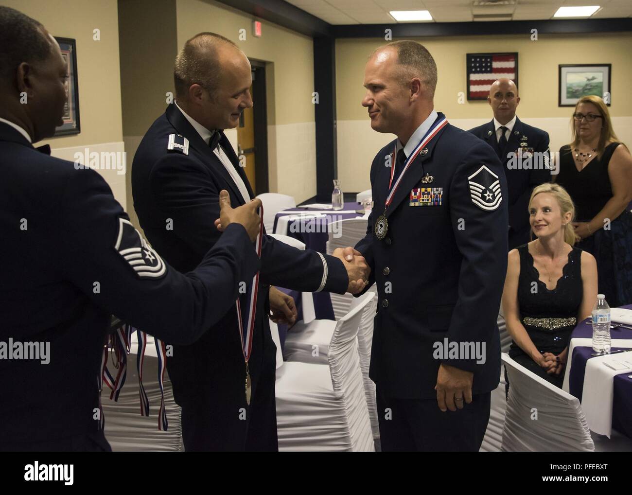 188th Wing Commander, Col. Robert I. Kinney, present the wing's new ...