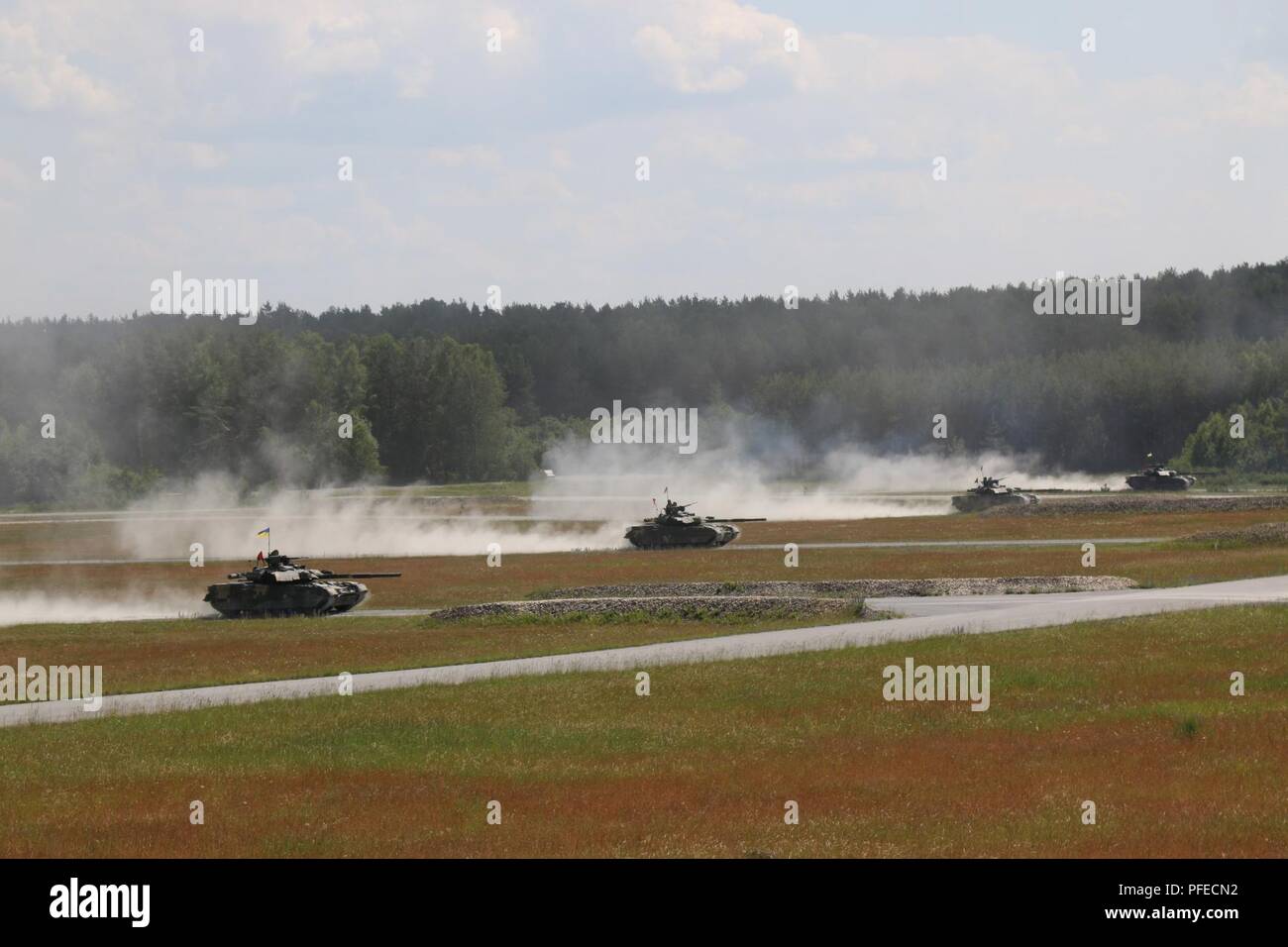 Ukrainian T-84 tanks take position during the offensive portion of the ...