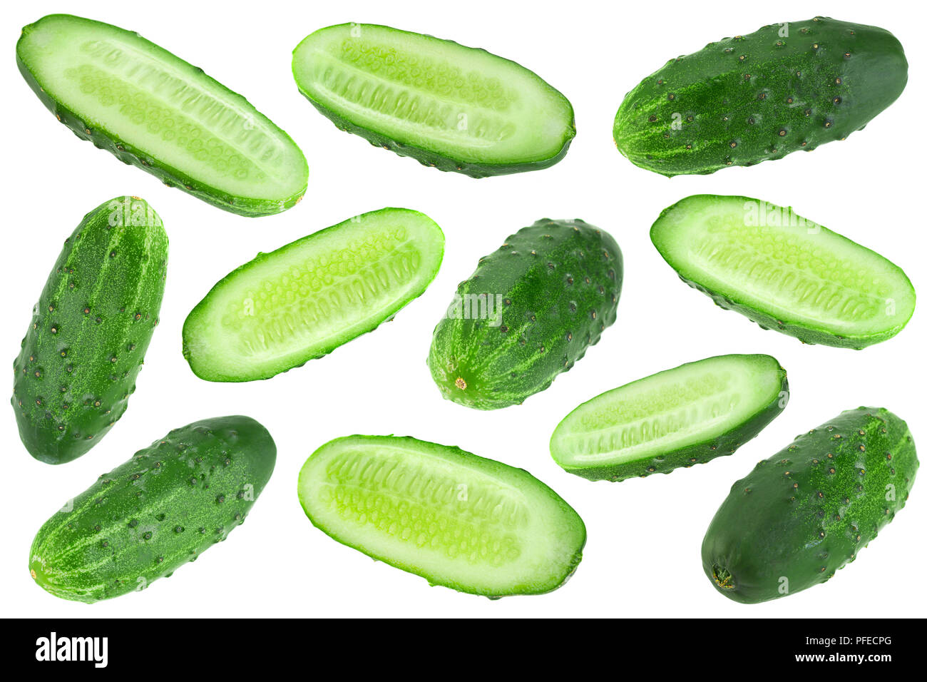 Cucumber slice closeup set isolated on white Stock Photo - Alamy
