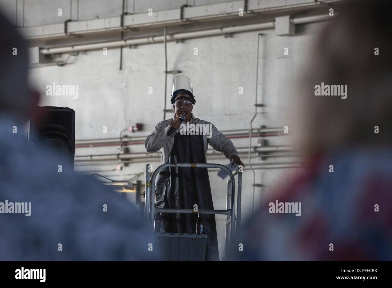 U.S. Marine Corps Sgt. Maj. Javier Duarte motivates the audience during ...