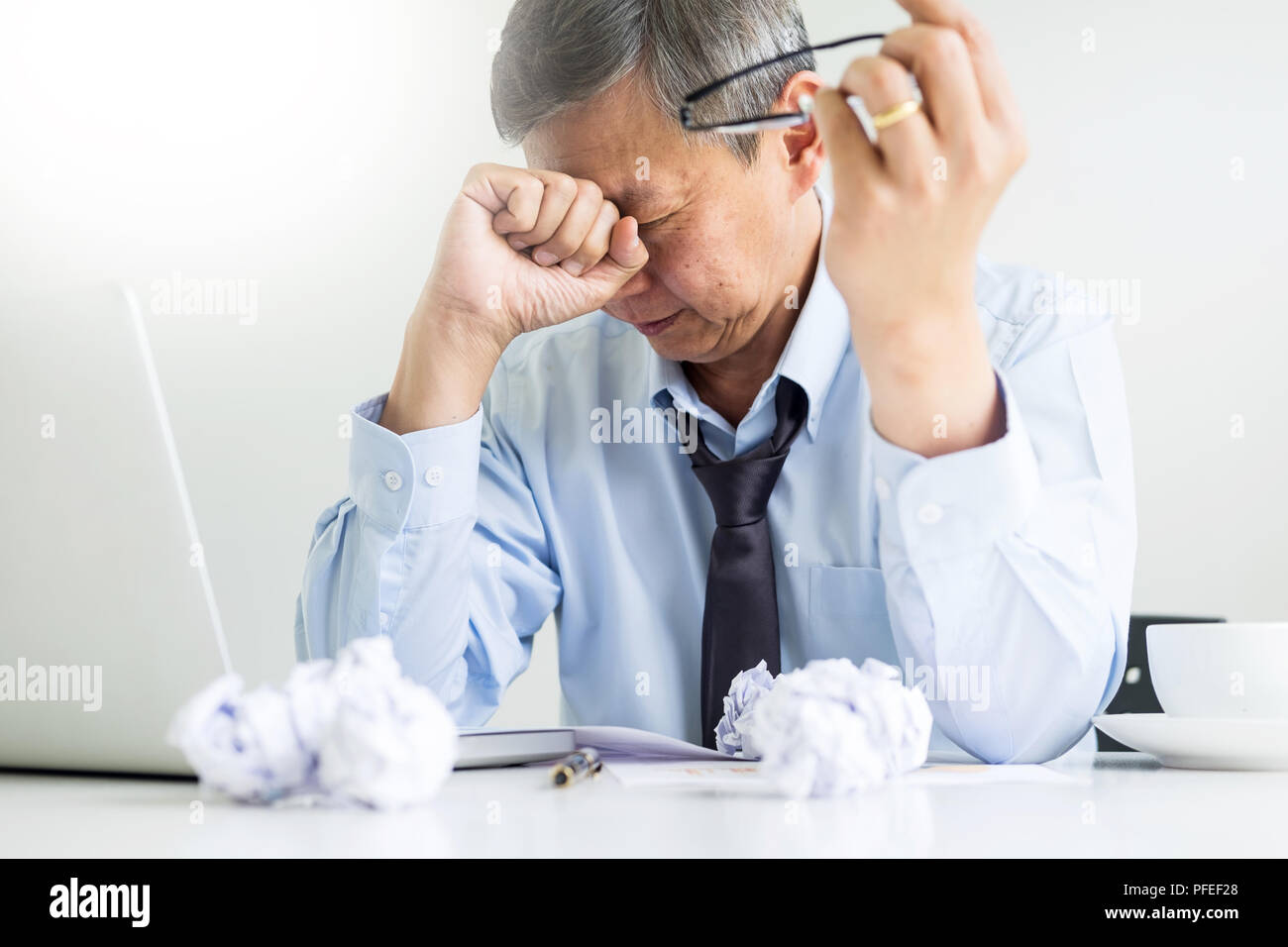 Depressed failure and tired businessman late sad and solving problem in ...