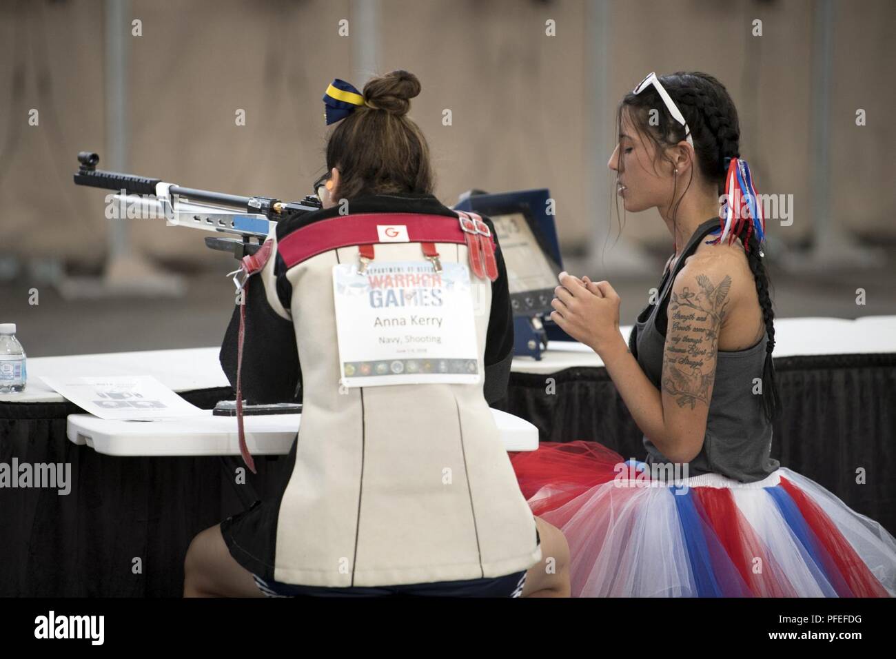 Coast Guard veteran Yeoman Krissy Esget prays for Navy Lt. Anna Kerry ...