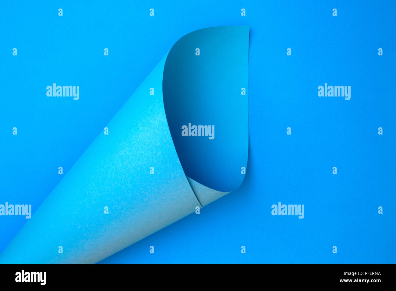 Abstract background of blue color paper sheets Stock Photo - Alamy