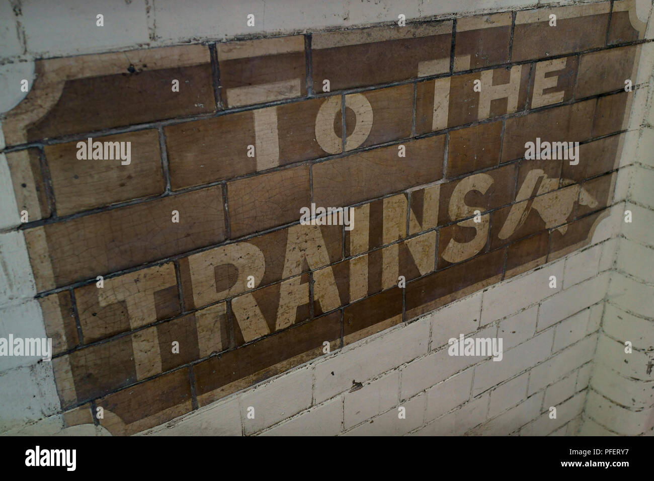 Edwardian wall sign at Stepney Green station to the District and ...