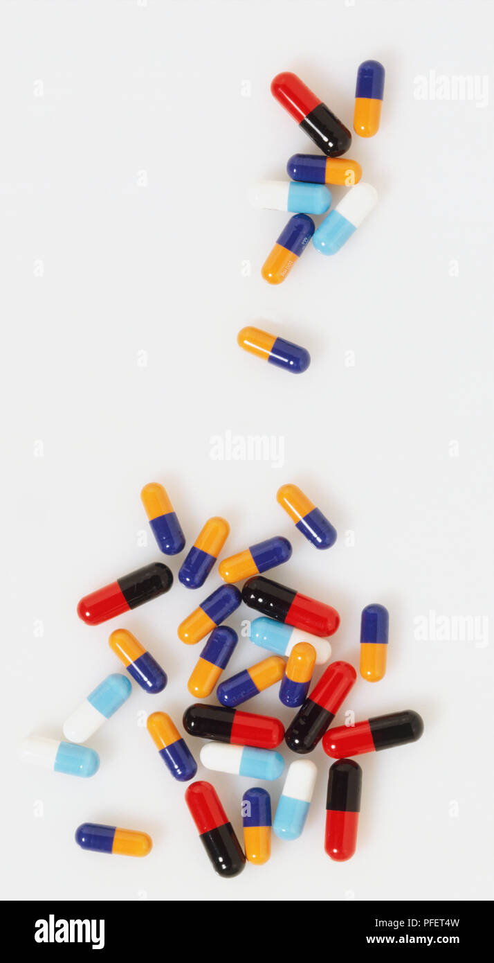 Assorted, colourful pill capsules Stock Photo - Alamy