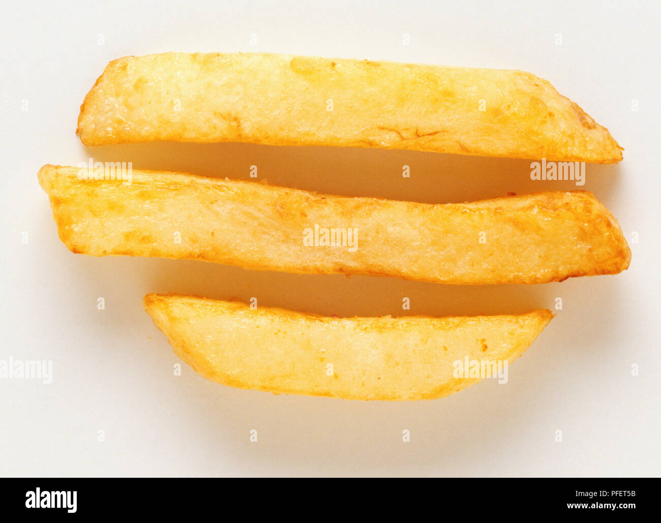 Three thick-cut Potato chips Stock Photo - Alamy