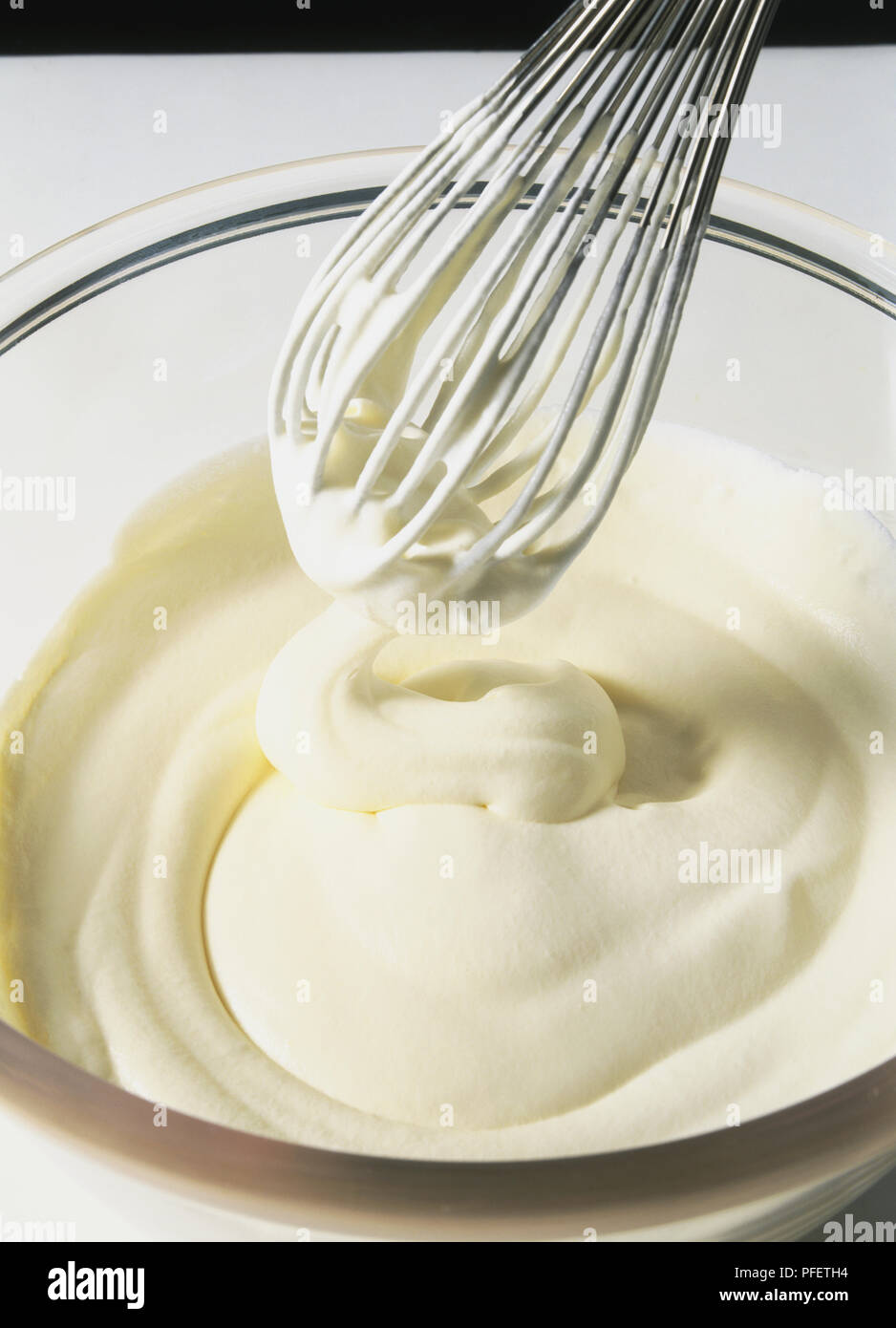 Hand whisk whipping cream hi-res stock photography and images - Alamy