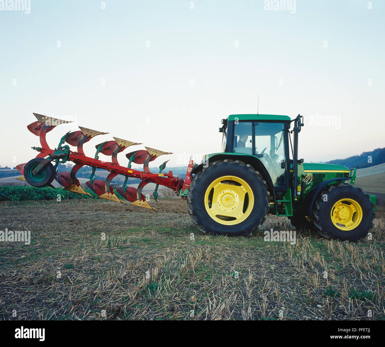 Tractor With Plough Attached Stock Photos & Tractor With Plough ...