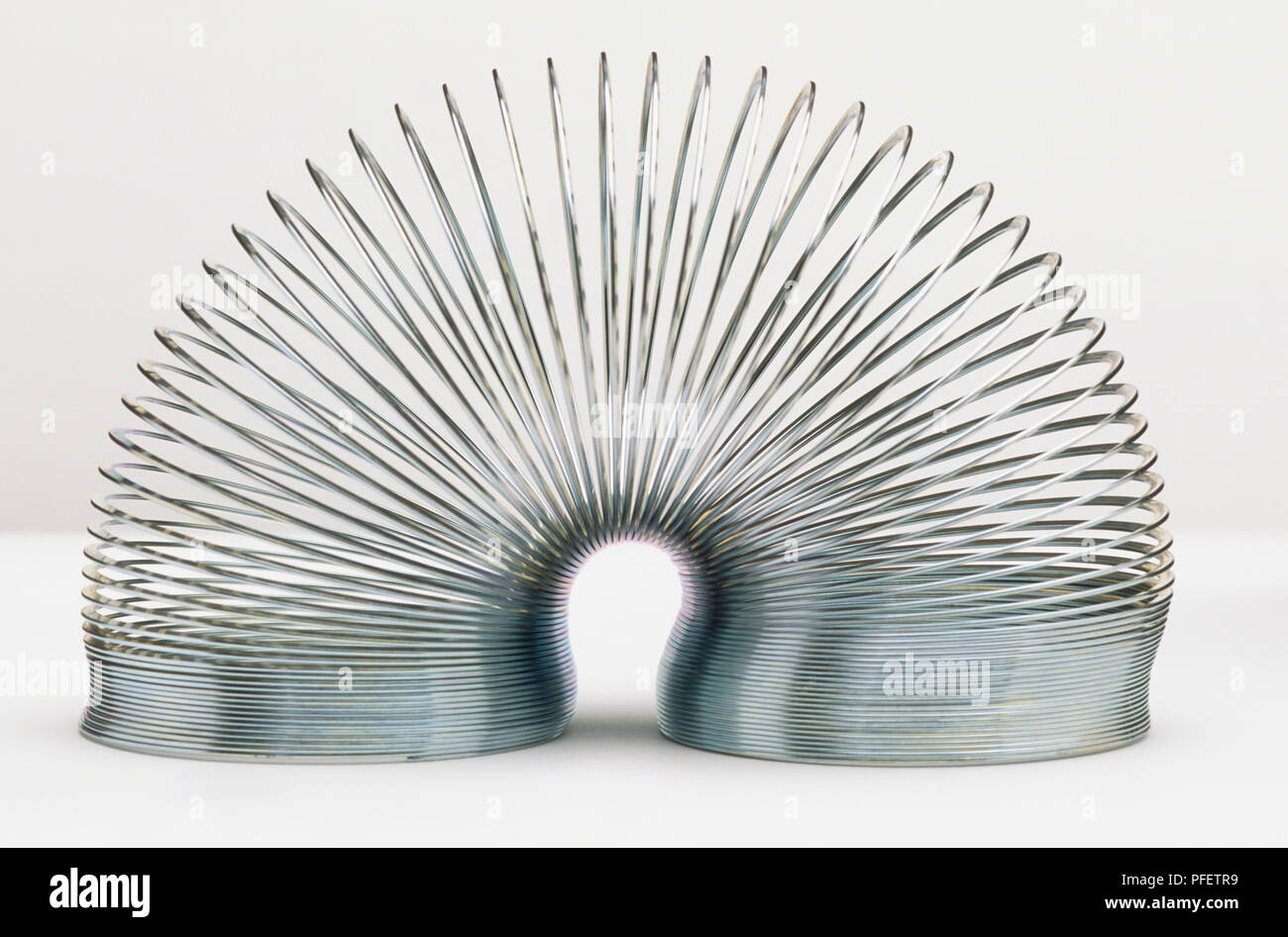 Metal slinkies hi-res stock photography and images - Alamy