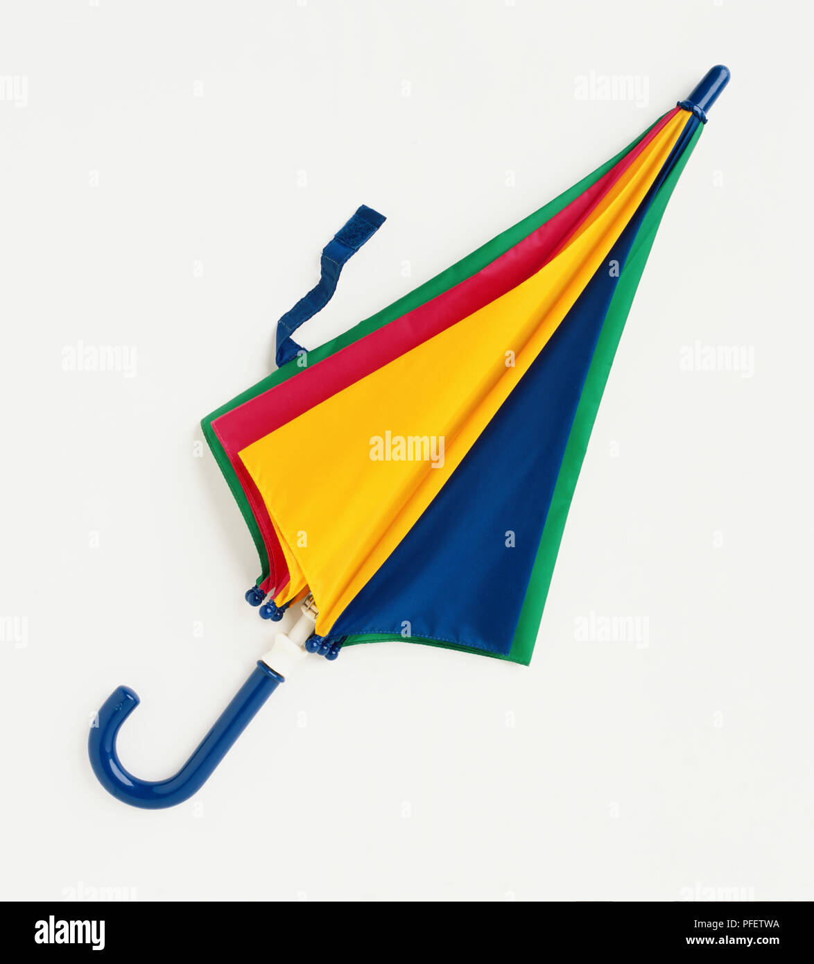 Multi coloured closed umbrella Stock Photo - Alamy