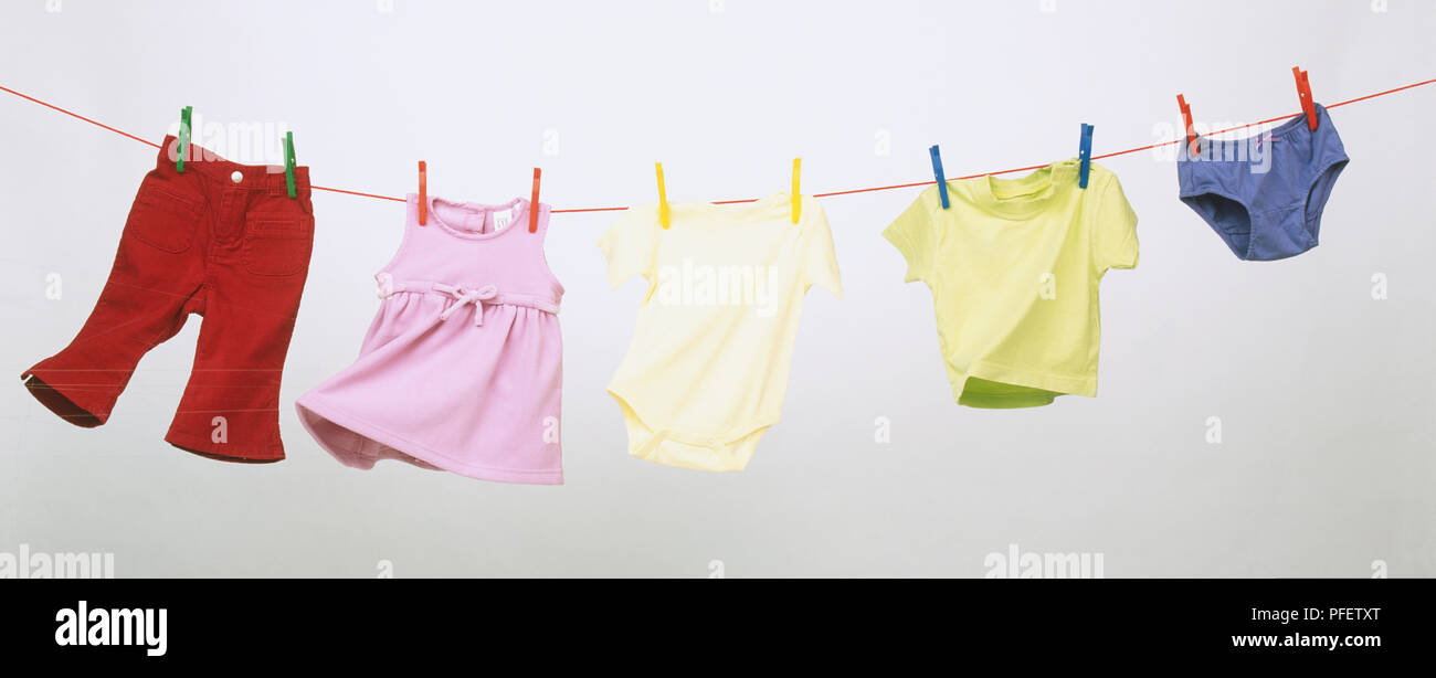 Washing on the line, blowing in the wind Stock Photo - Alamy