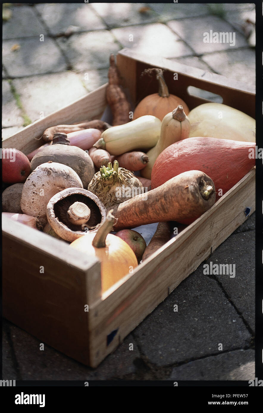 Selection of organic vegetables in wooden crate, variable focus Stock ...