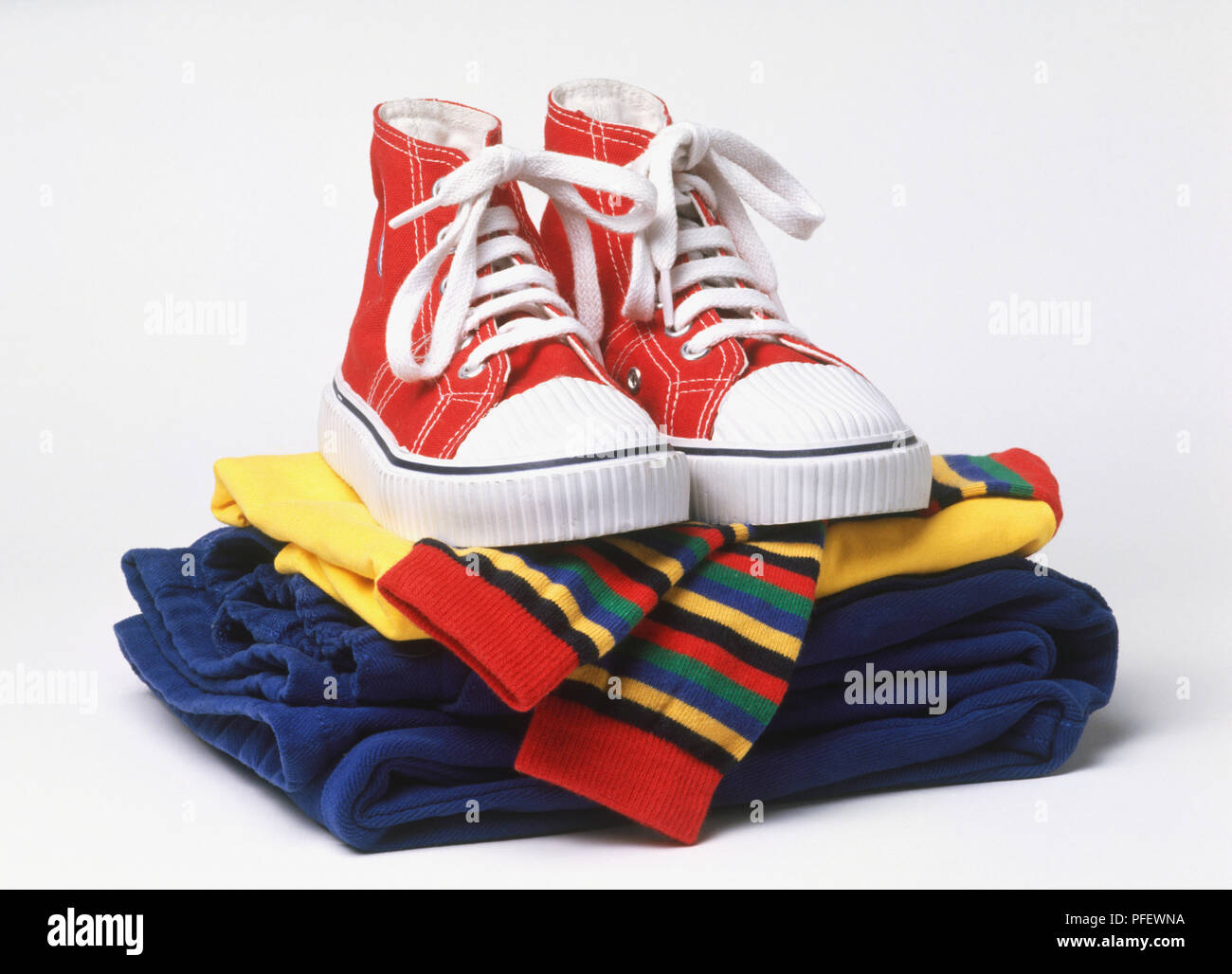 Folded jumpers hi-res stock photography and images - Alamy