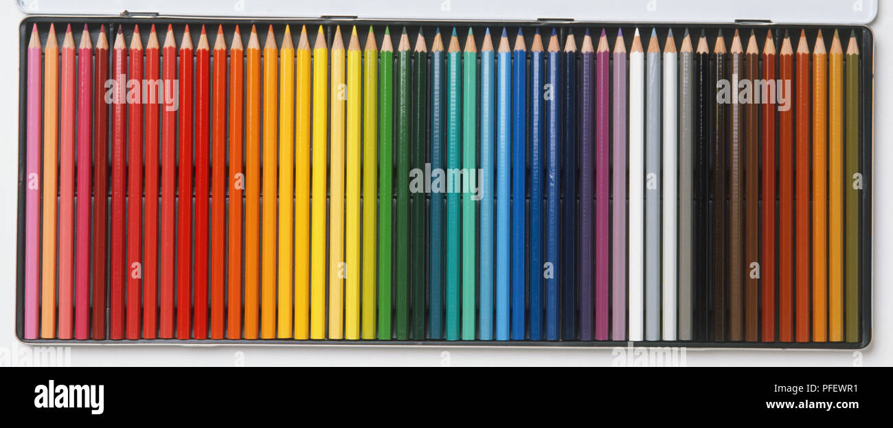 Set of crayons in different shades of red, yellow, green, blue, grey ...